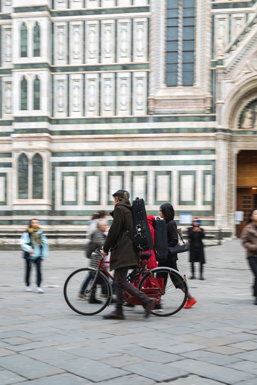 Man Walking Bike in Front of Duomo in Florence | Kevin Hou Photography